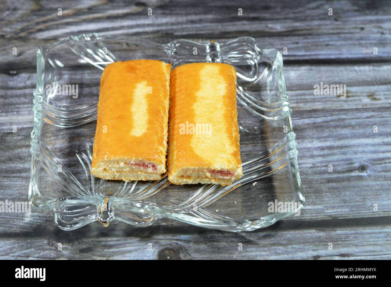 Swiss roll cake filled cream with strawberry flavor, Spongy cake with ...