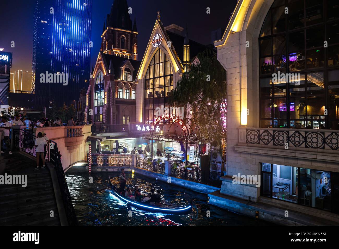 Visitors enjoy night view at a scenic spot featuring landscape similar ...