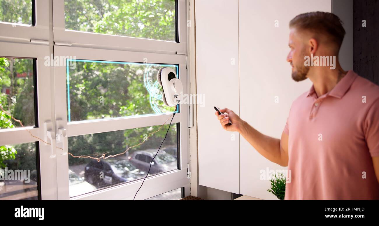 Automatic Glass Cleaner Robot. Home Washing Equipment Stock Photo - Alamy