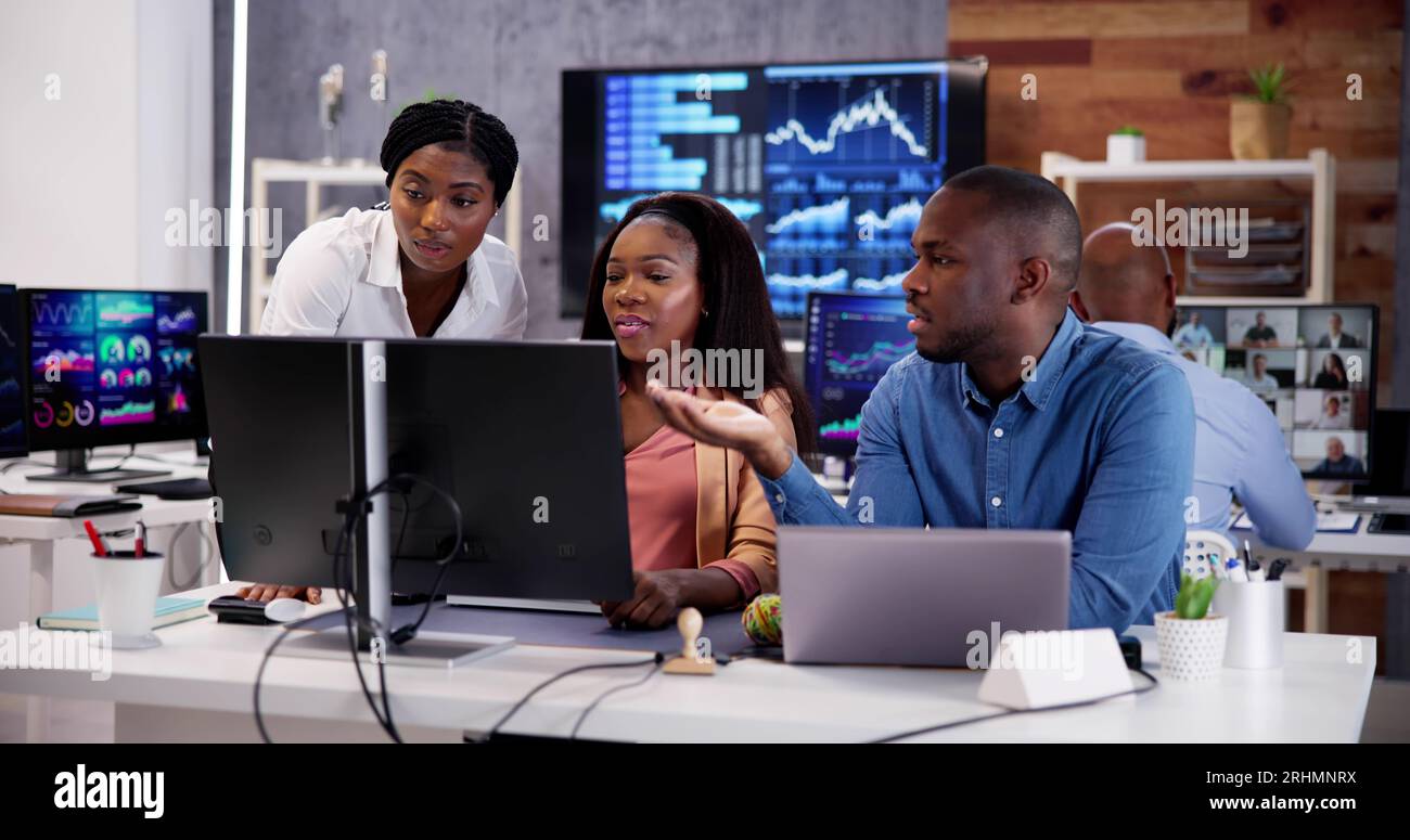 African Financial Data Analysts Using Performance Dashboard On Screens ...