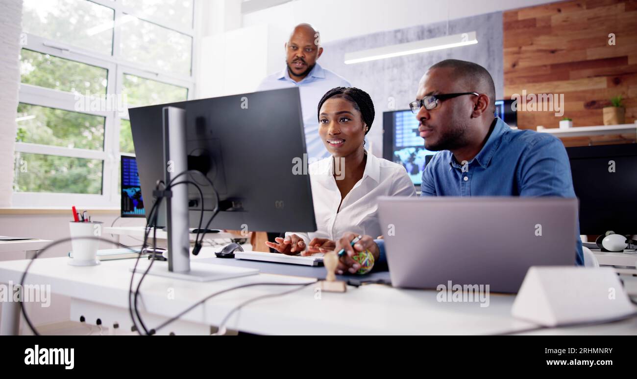 African Financial Data Analysts Using Performance Dashboard On Screens ...