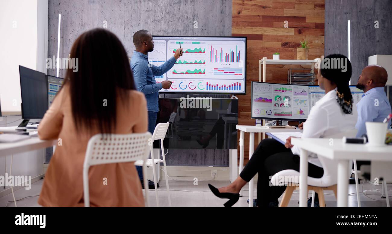 Corporate Training Presentation In Classroom With Computers Stock Photo ...