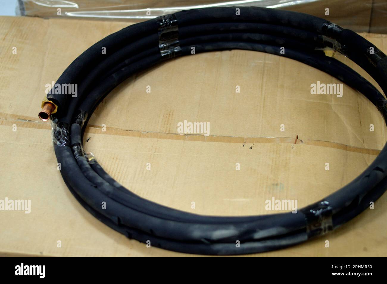 Air conditioning copper pipes tubes covered with black rubber, copper ...