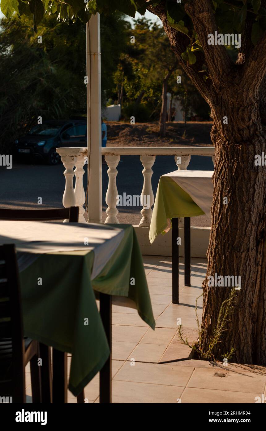 Empty Greek restaurant on the Mediterranean Sea in Rhodes Stock Photo ...