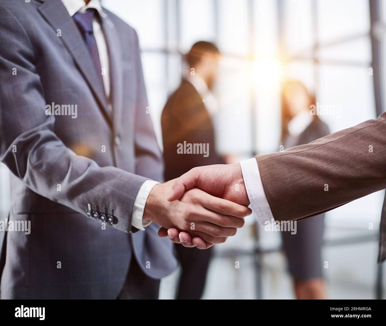 Nice to meet you. Close-up of two young businessmen shaking hands Stock ...