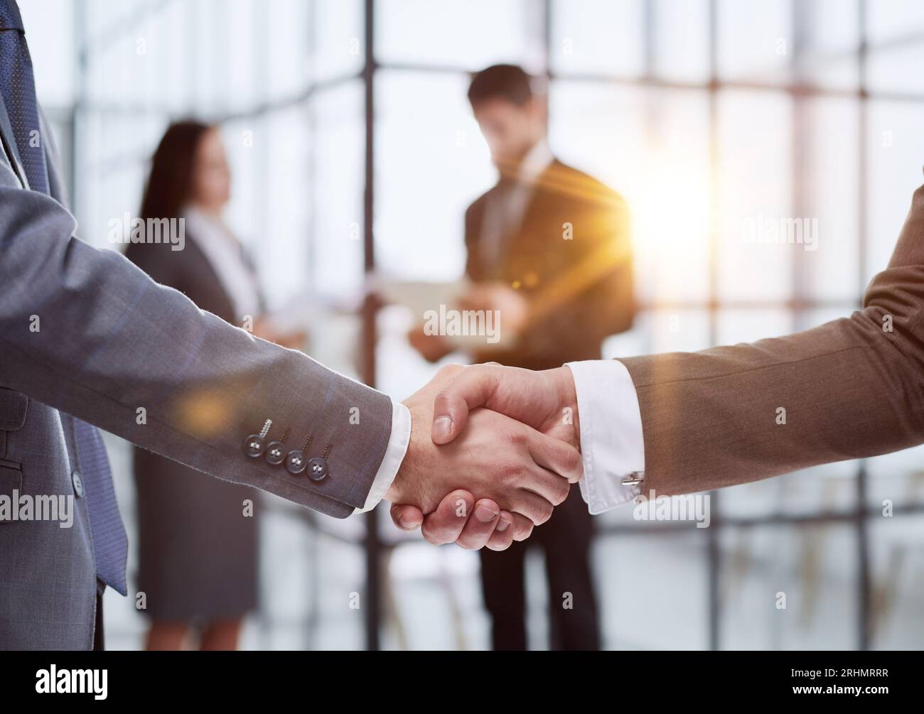 Nice to meet you. Close-up of two young businessmen shaking hands Stock ...
