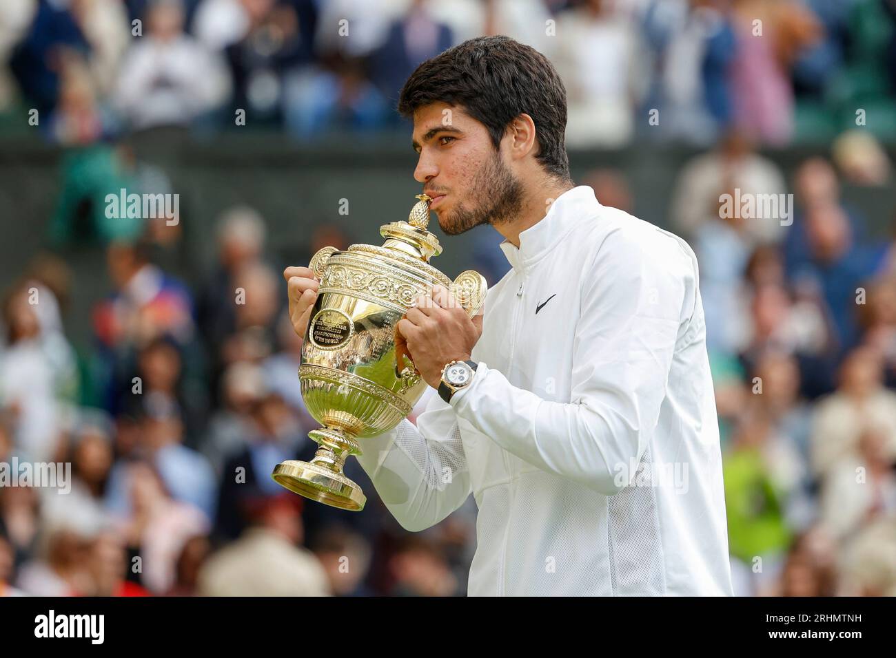 Spanish tennis player Carlos Alcaraz (ESP) holding the championship ...