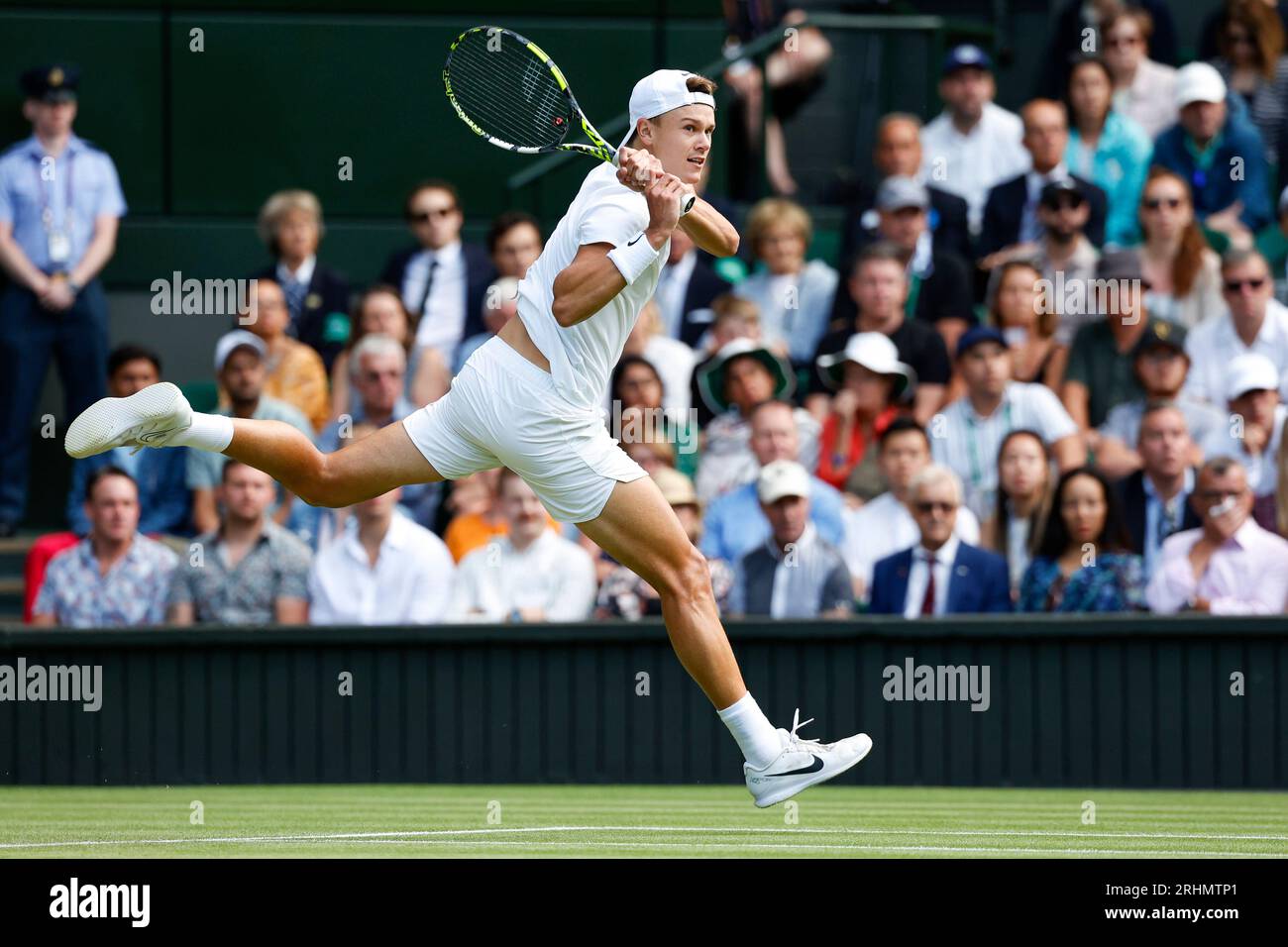 Tennis player Holger Rune (DK) in action at the 2023 Wimbledon ...