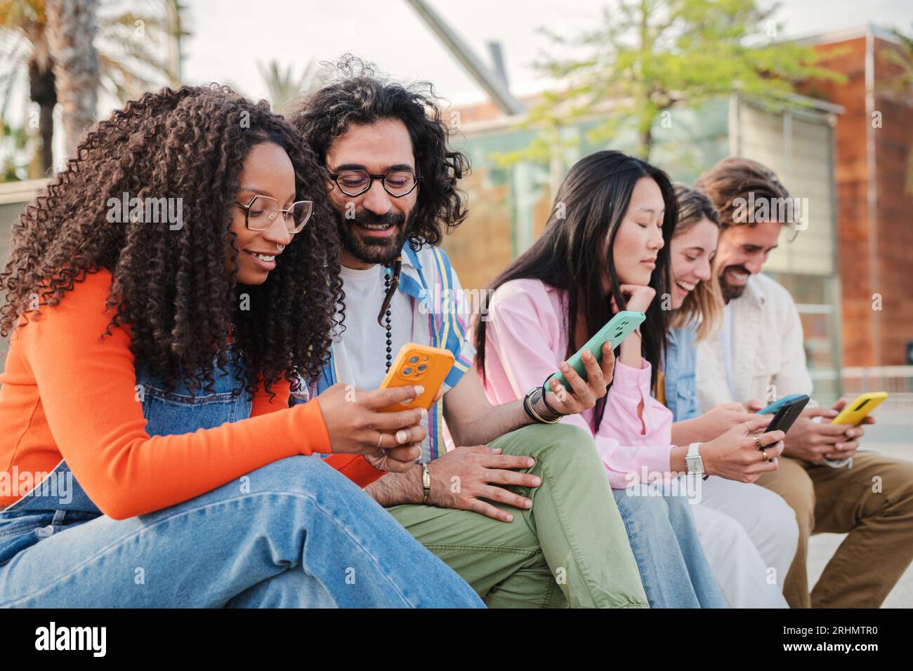Female friends using cellphones on hi-res stock photography and images ...