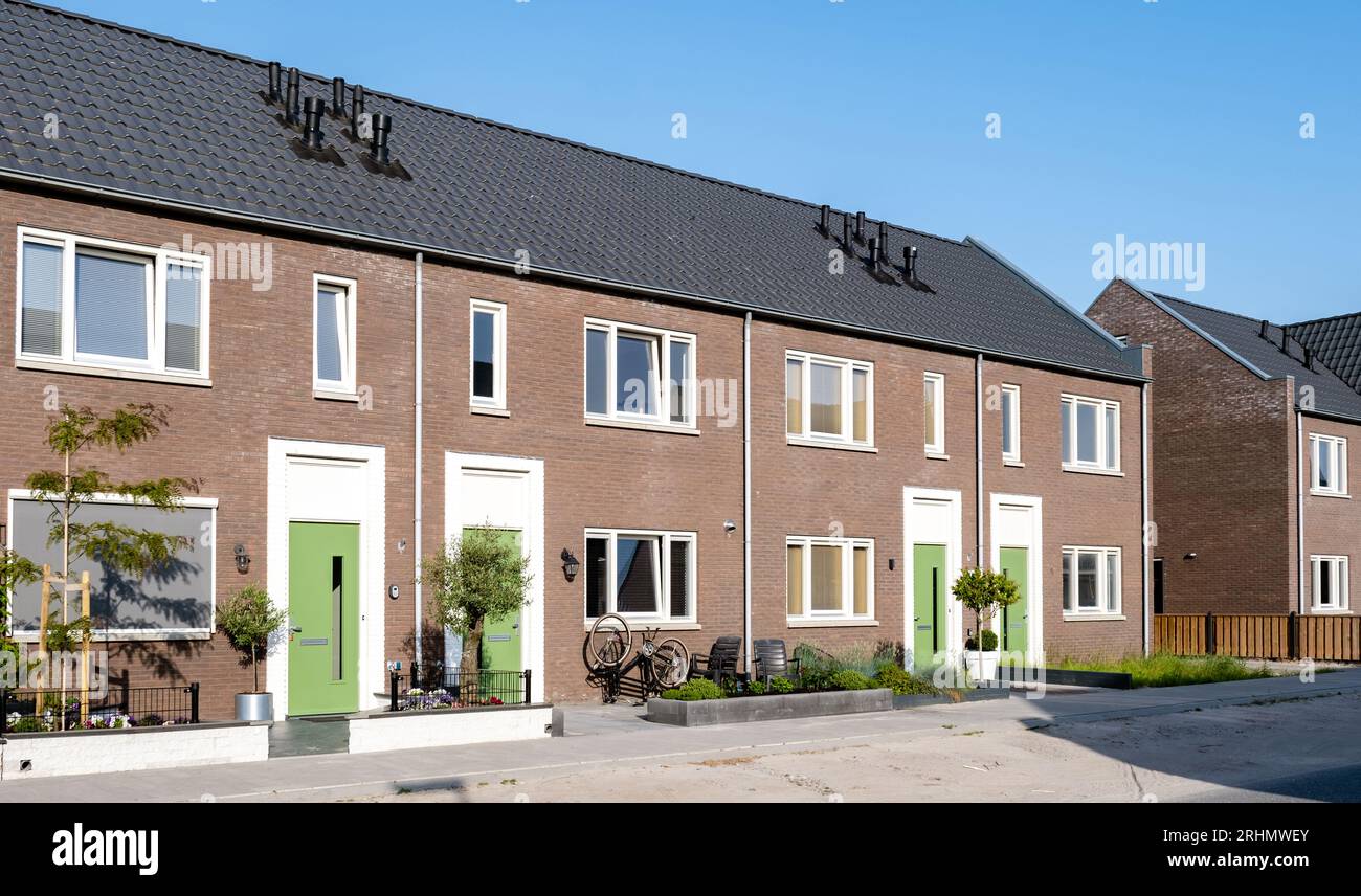 Dutch Suburban area with modern family houses, newly build modern ...