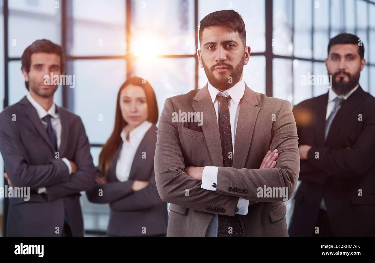 Business team standing in office and look at camera Stock Photo - Alamy