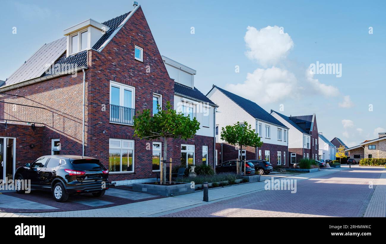 Dutch Suburban area with modern family houses, newly built modern ...