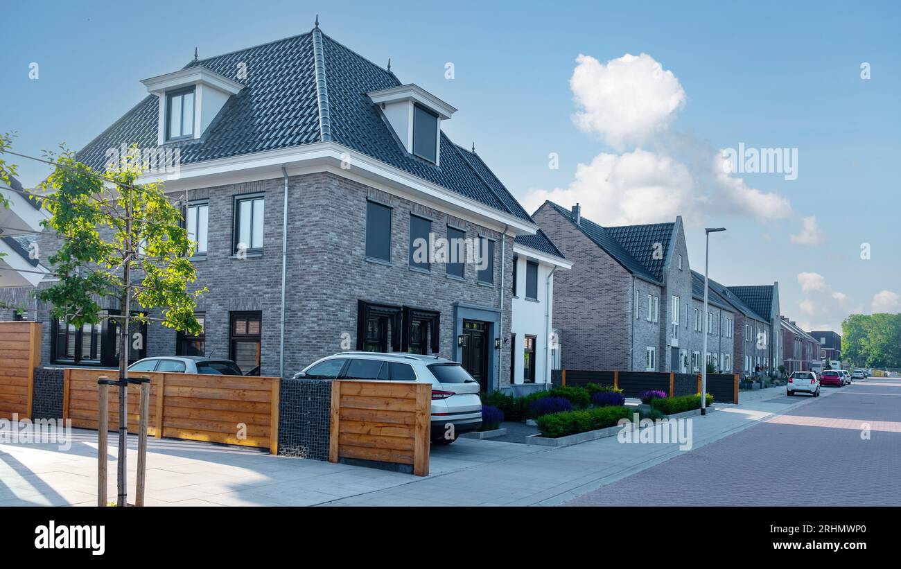 Dutch Suburban area with modern family houses, newly built modern ...