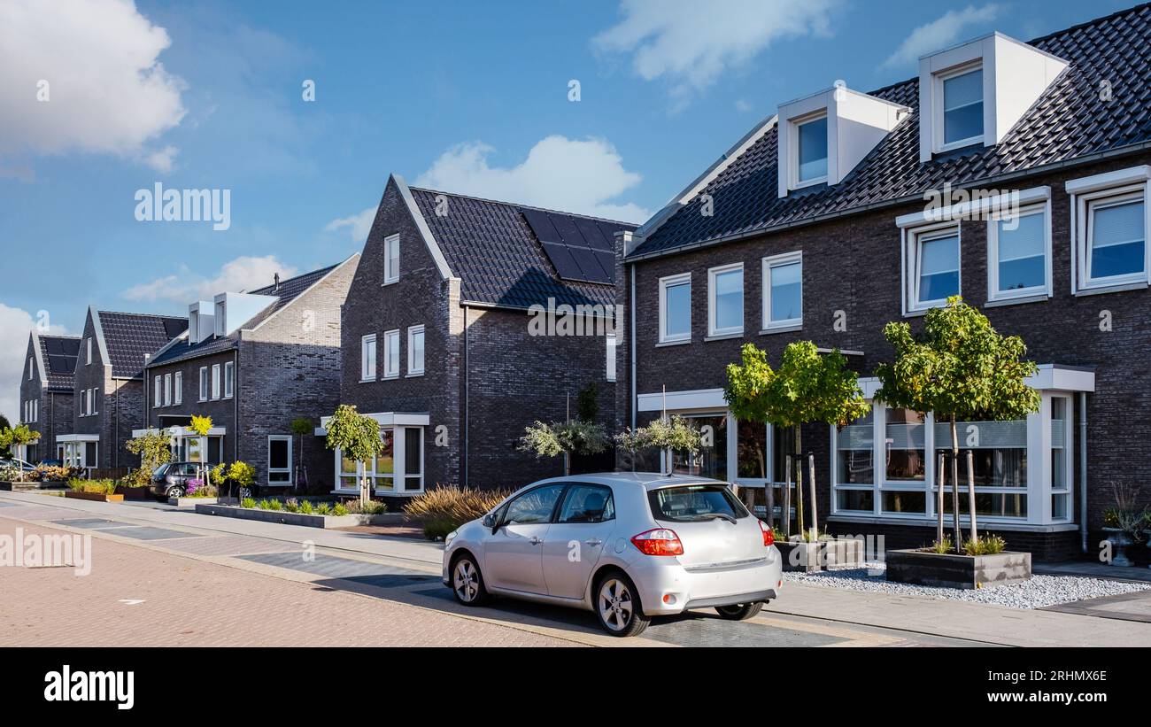 Dutch Suburban area with modern family houses, newly build modern ...