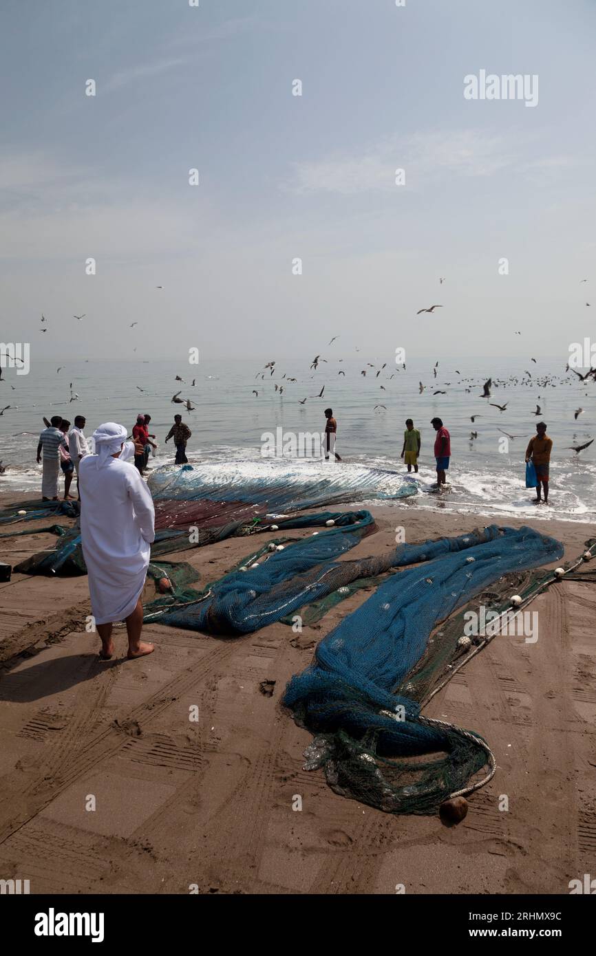 Fishing with net beach hi-res stock photography and images - Alamy