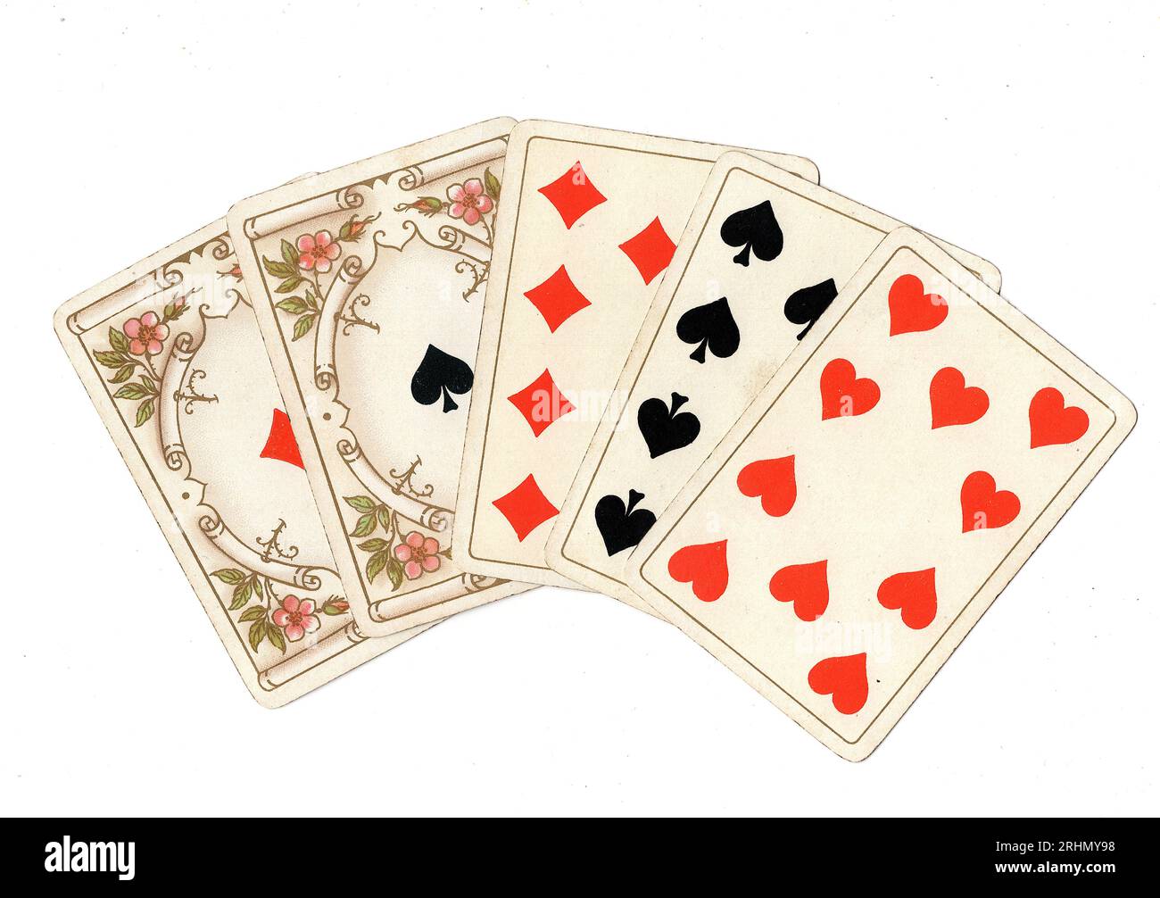 A poker hand of antique playing cards featuring a full house of tens ...