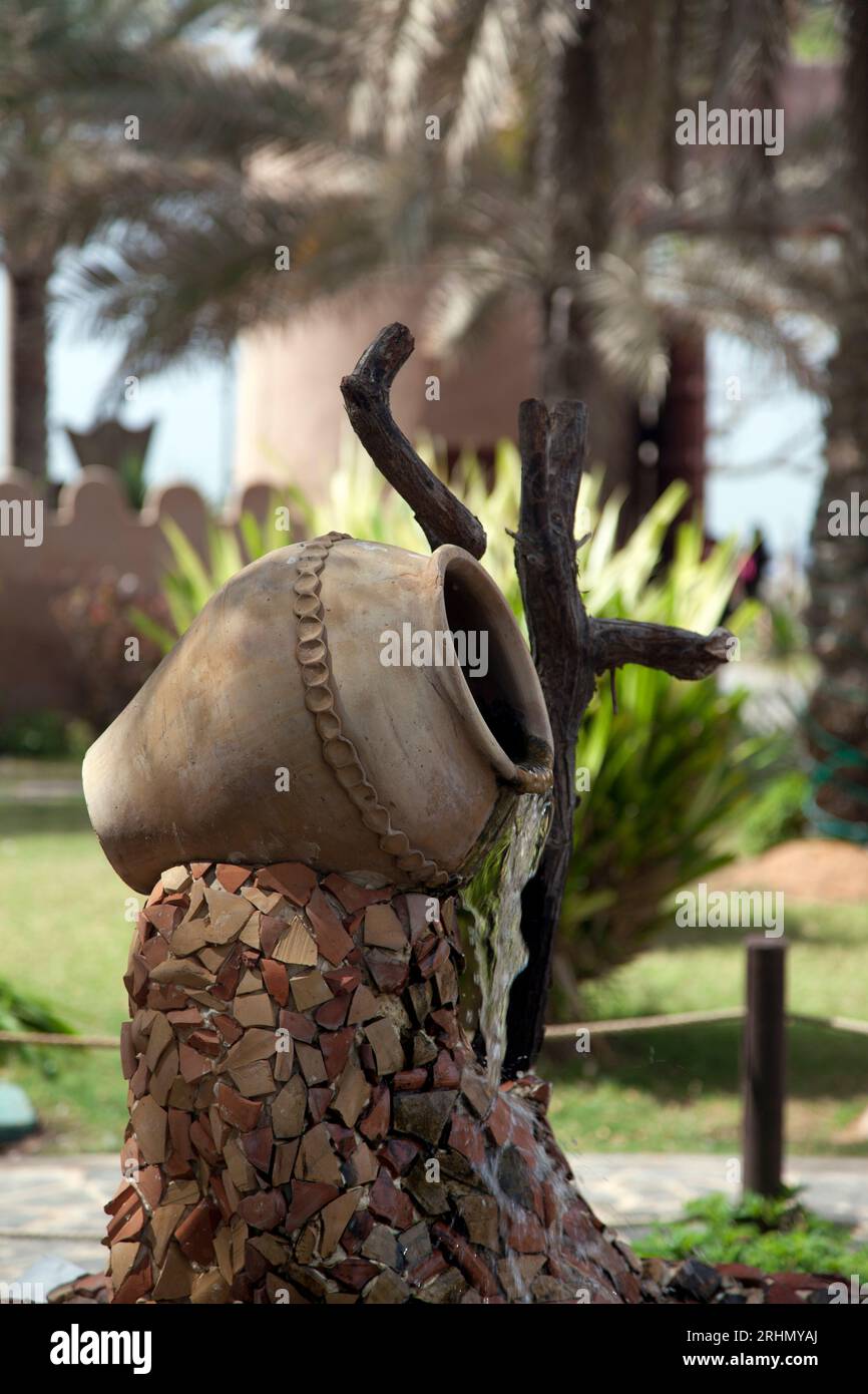 United Arab Emirates, Abu Dhabi, Heritage village, stone water jug ...