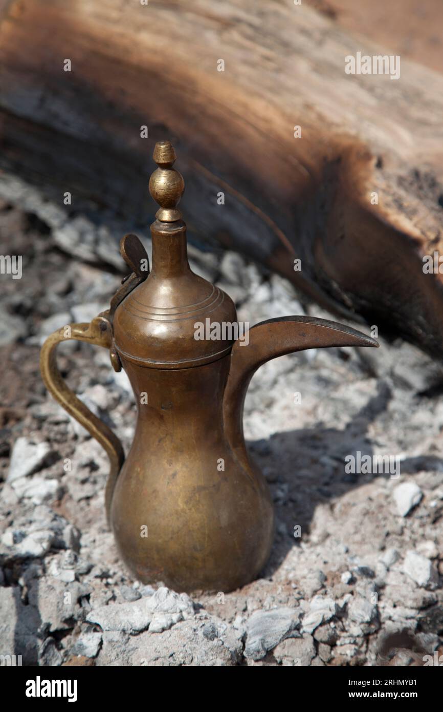 United Arab Emirates, Abu Dhabi, traditional arabic teapot on coals ...