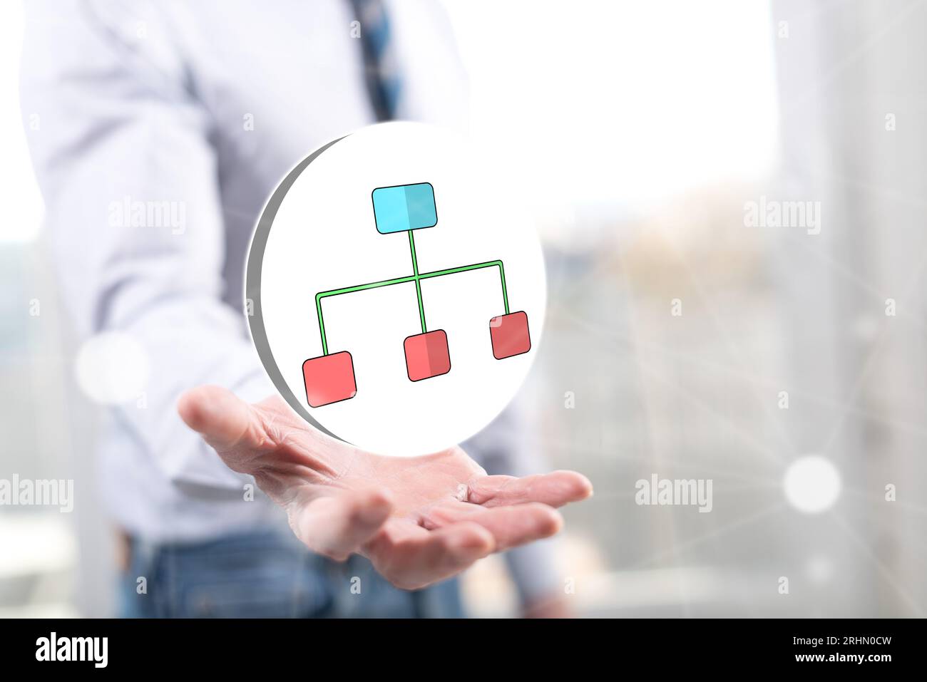 Hierarchy concept above the hand of a man in background Stock Photo - Alamy