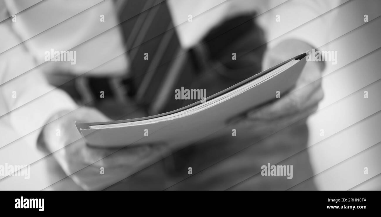 Businessman holding paper documents Black and White Stock Photos ...