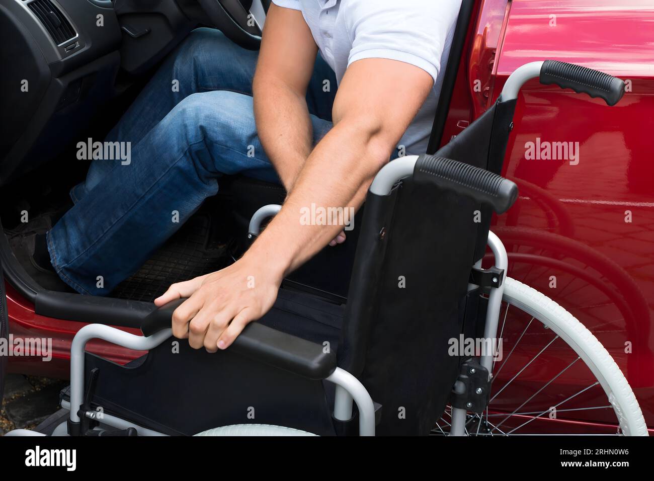 Photo Of A Car Driver With A Wheelchair Stock Photo - Alamy
