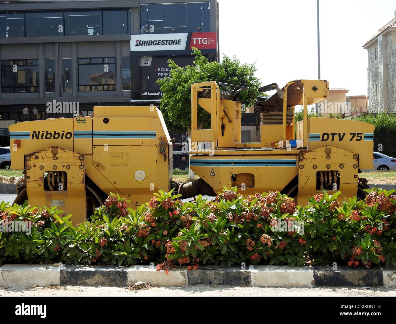 Cairo, Egypt, July 21 2023: Asphalt compactor paver truck, A paver ...