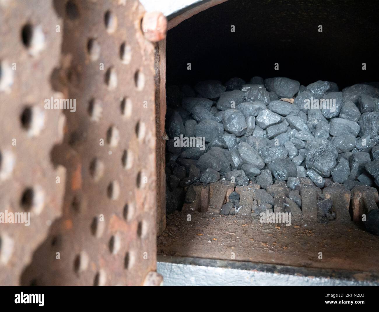 Coal in the oven, stones of coal background. Black fuel close view ...