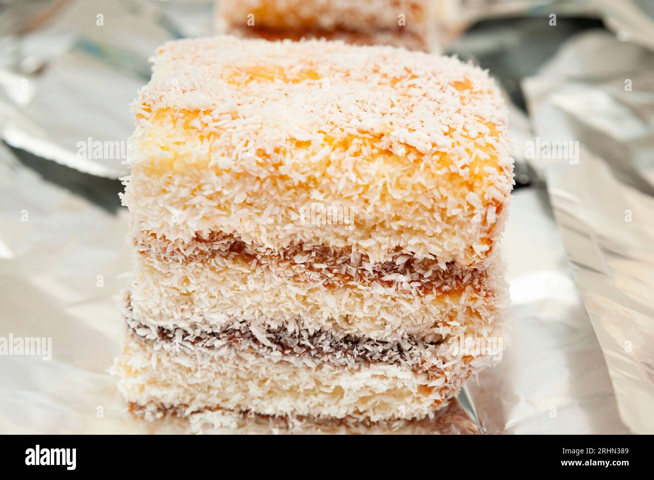 Delicious Brazilian traditional dessert known as BOLO GELADO in front ...