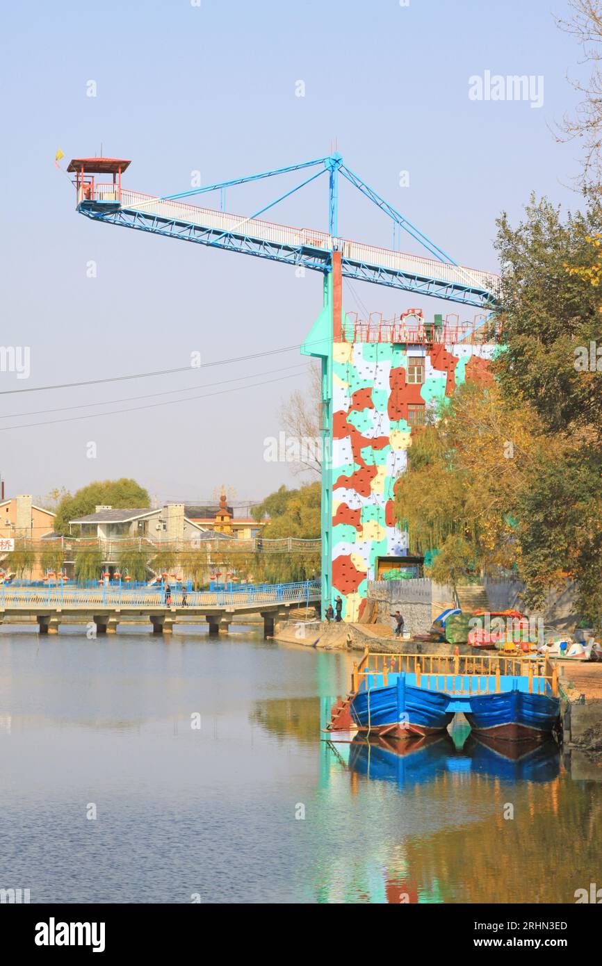 bungee jumping and trees in a park, north china Stock Photo - Alamy