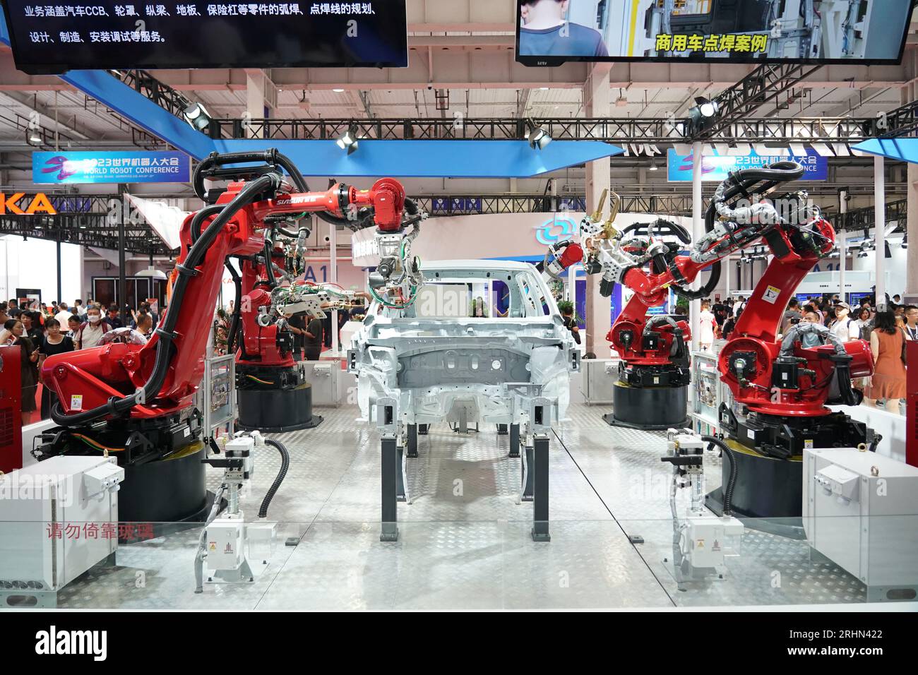 Beijing, China. 18th Aug, 2023. Welding robots are pictured at the ...