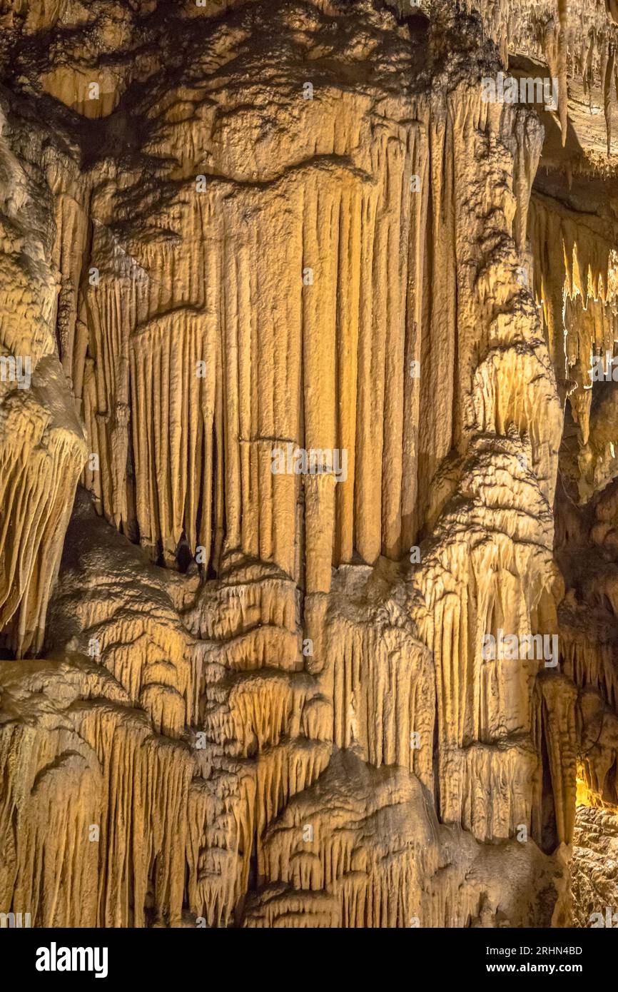 Dripstone formation in limestone cave of Grotte des Demoiselles in ...