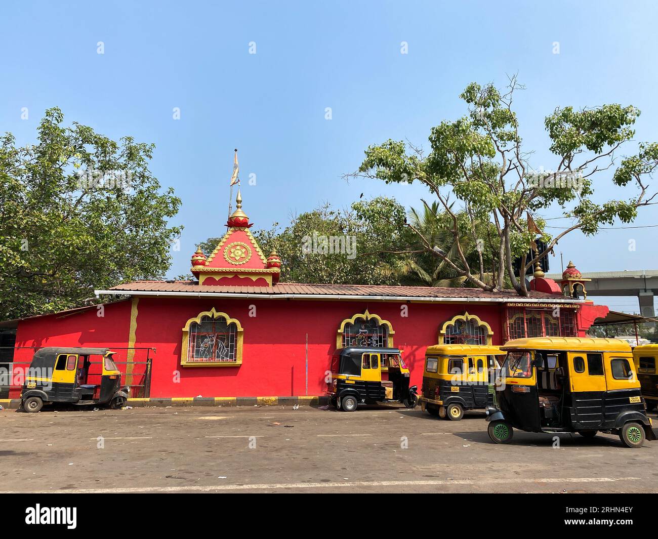 Panjim, Goa, India - January 2023: Autorickshaws parked outside a red ...