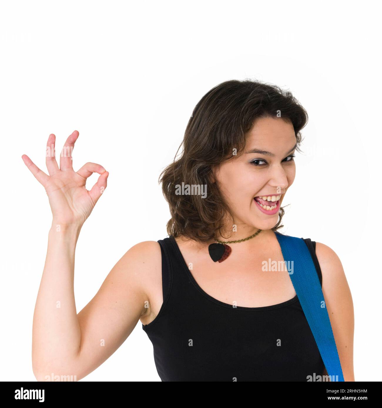 Smiling Female guitarist OK gesture on white background Model release ...