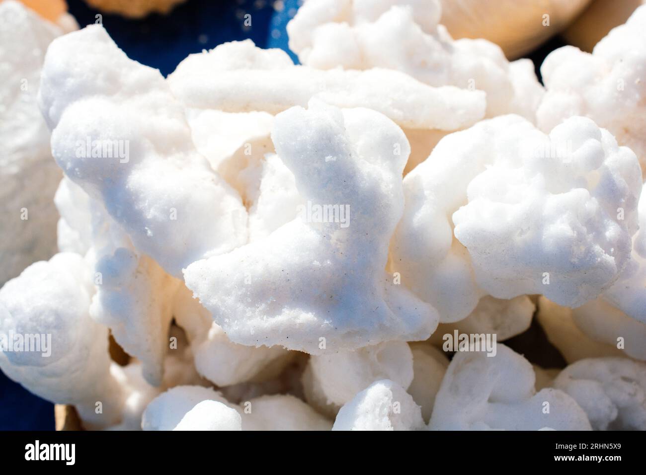 Small chunks of white salt Stock Photo - Alamy