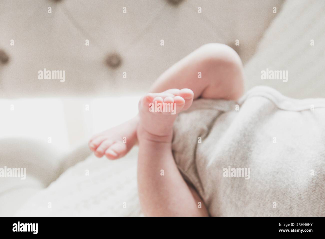 Newborn Baby Legs & Feet, Bright & Airy Aesthetic Stock Photo - Alamy