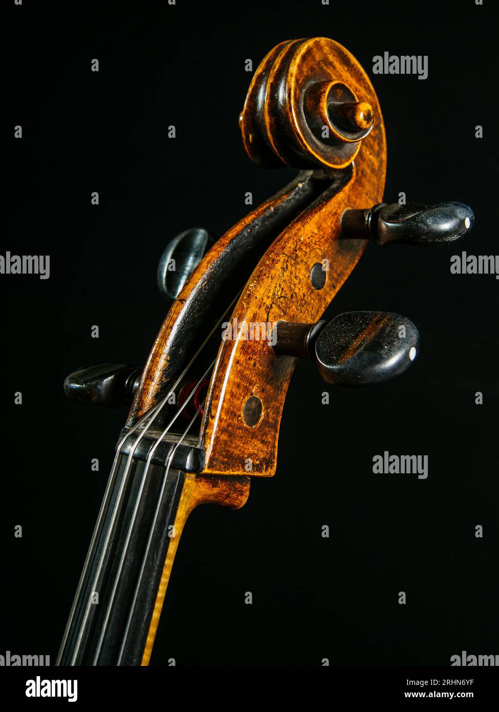 Closeup image of an old cello scroll or headstock Stock Photo - Alamy