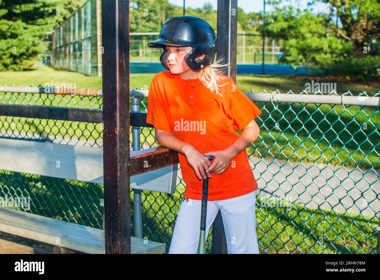 10 year old girl the batter on the little league team Stock Photo - Alamy