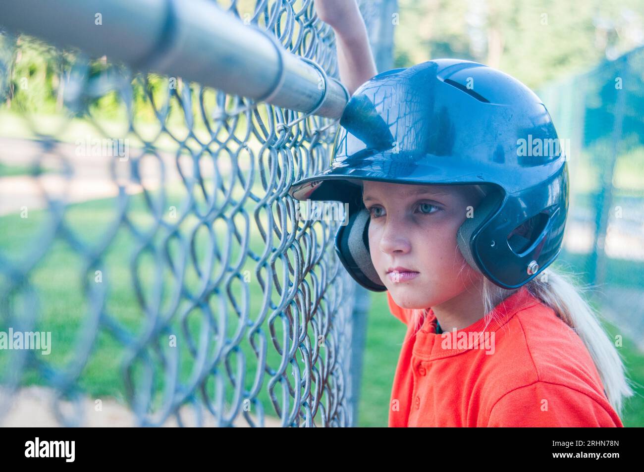 10 year old girl the batter on the little league team Stock Photo - Alamy