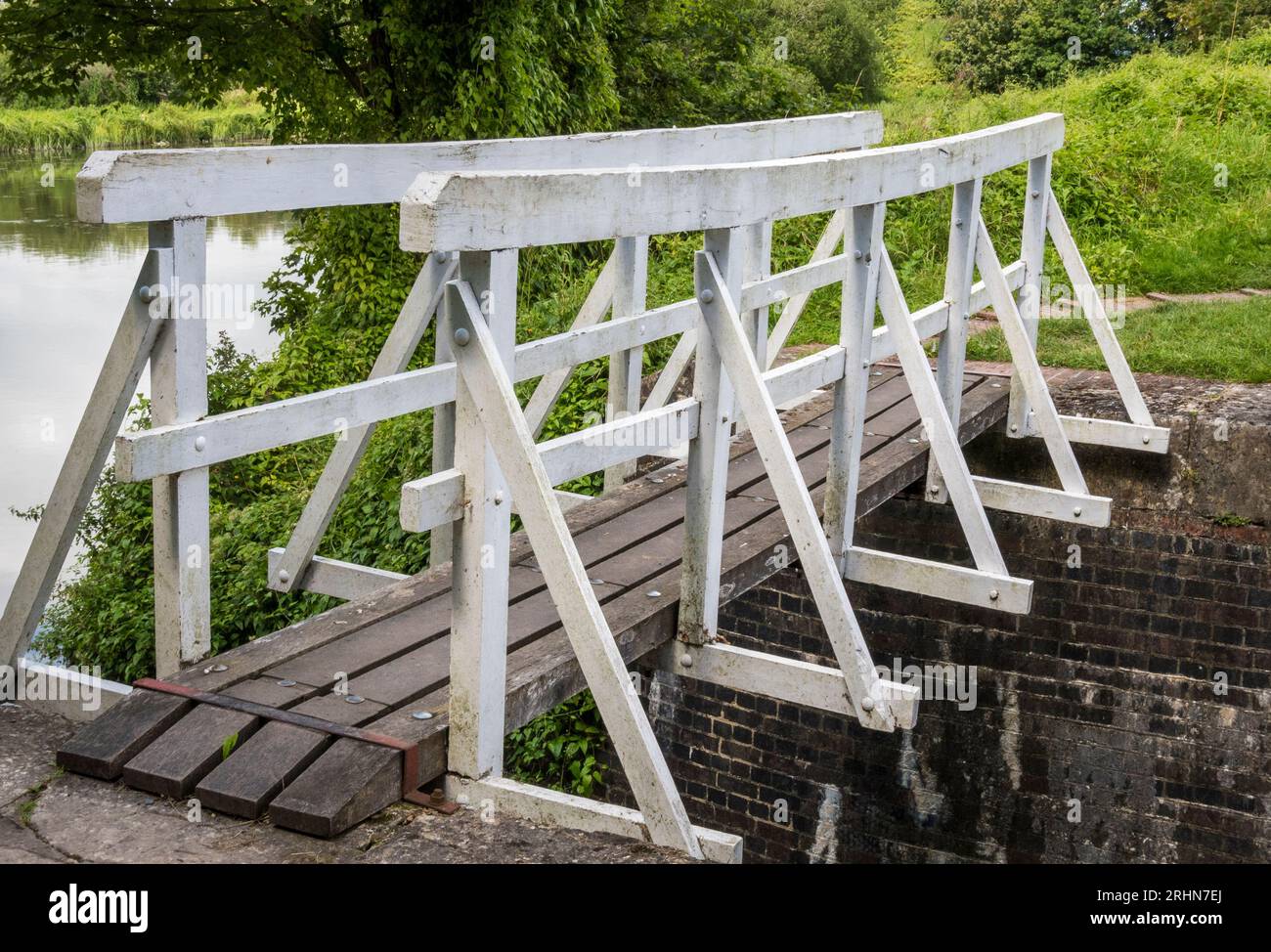 Pedestrian bridge over a canal Stock Photo - Alamy
