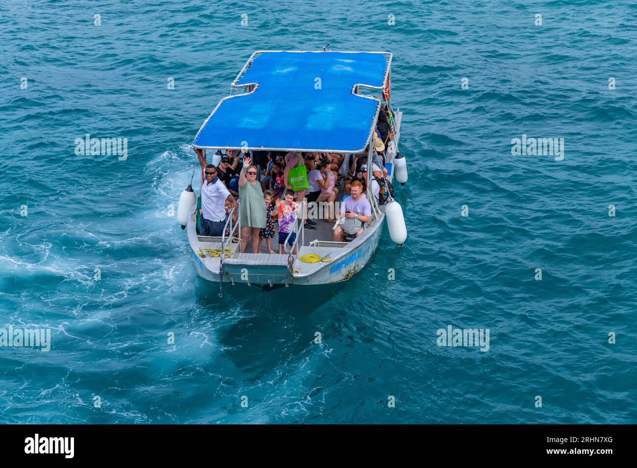 Nadi, Fiji - 24 May, 2023: Group of tourists on a ship in the coast of ...