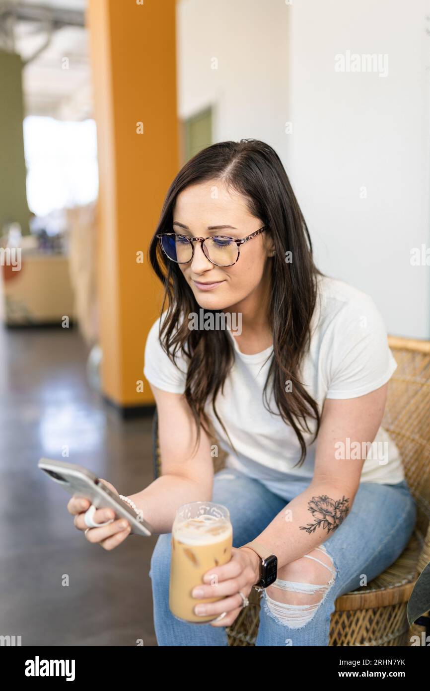 Business woman scrolling mobile work hi-res stock photography and ...