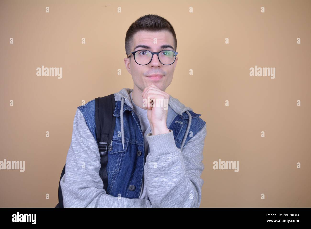 Thinking Handsome Caucasian Student with Glasses Leaning on Hand ...