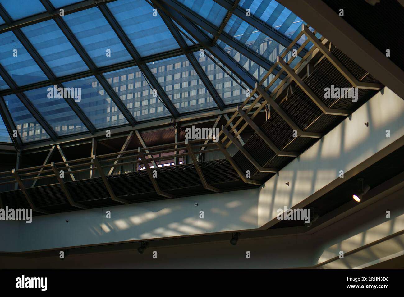 Pinacle of steel and glass that make the roof of a shopping mall, seen ...