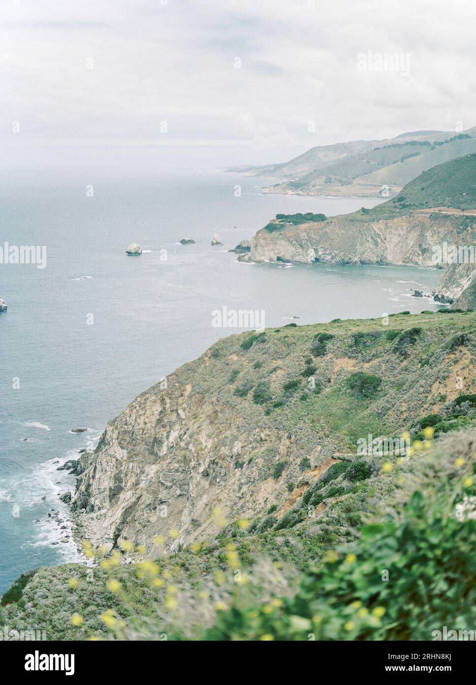 Vertical view of Big Sur coastline from cliff Stock Photo - Alamy