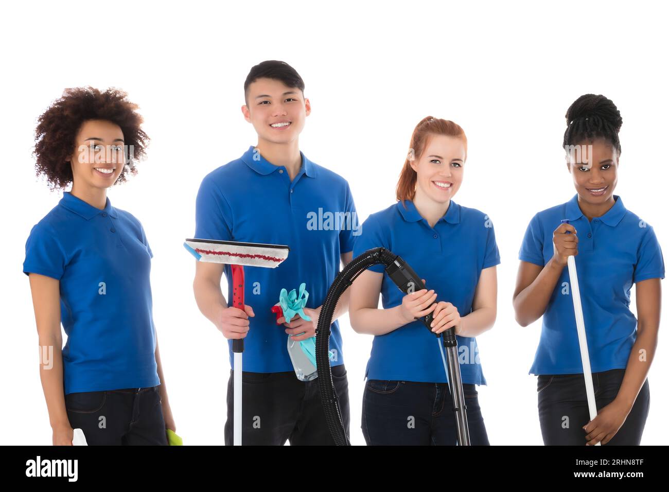 Group Of Happy Janitors With Cleaning Equipment Stock Photo - Alamy