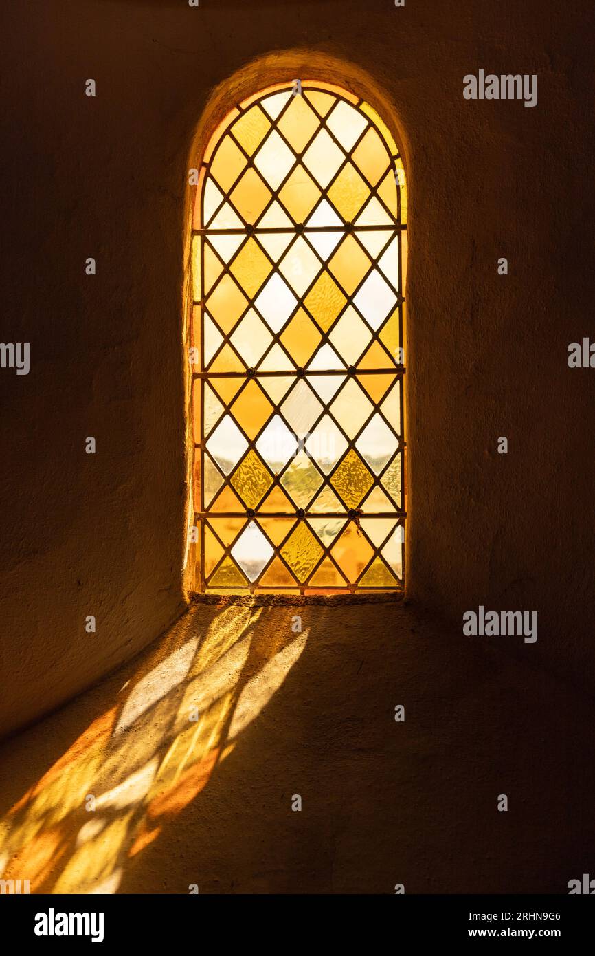 sun is shining through a window of a church Stock Photo - Alamy