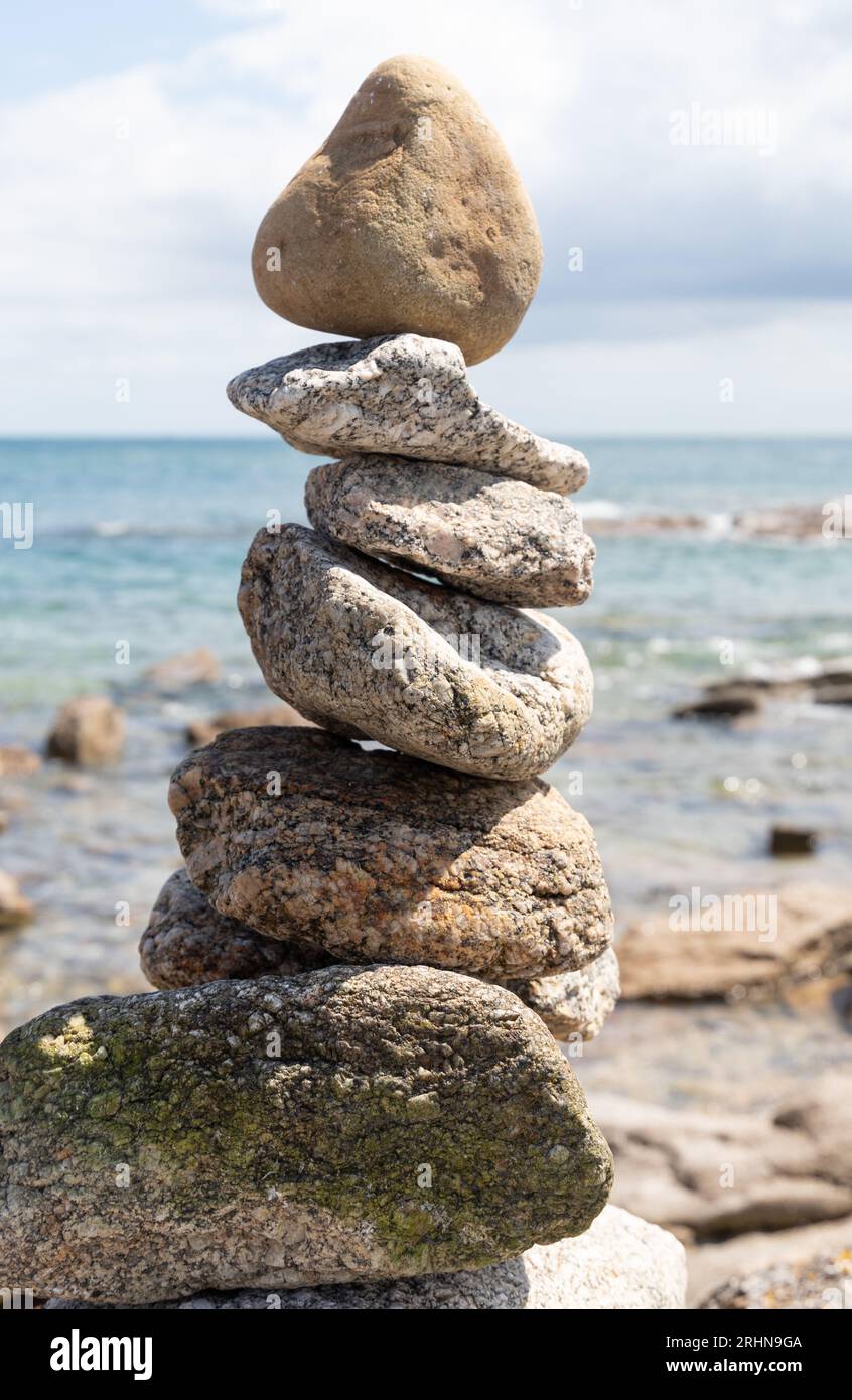 stack of stones on a beach in Normandie Stock Photo - Alamy
