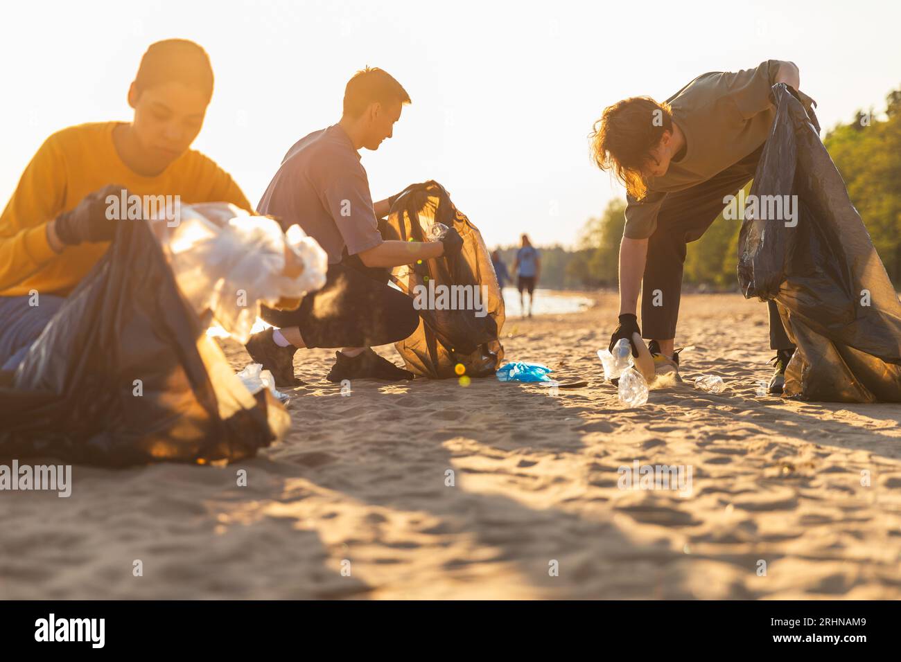 Group people collects trash hi-res stock photography and images - Alamy