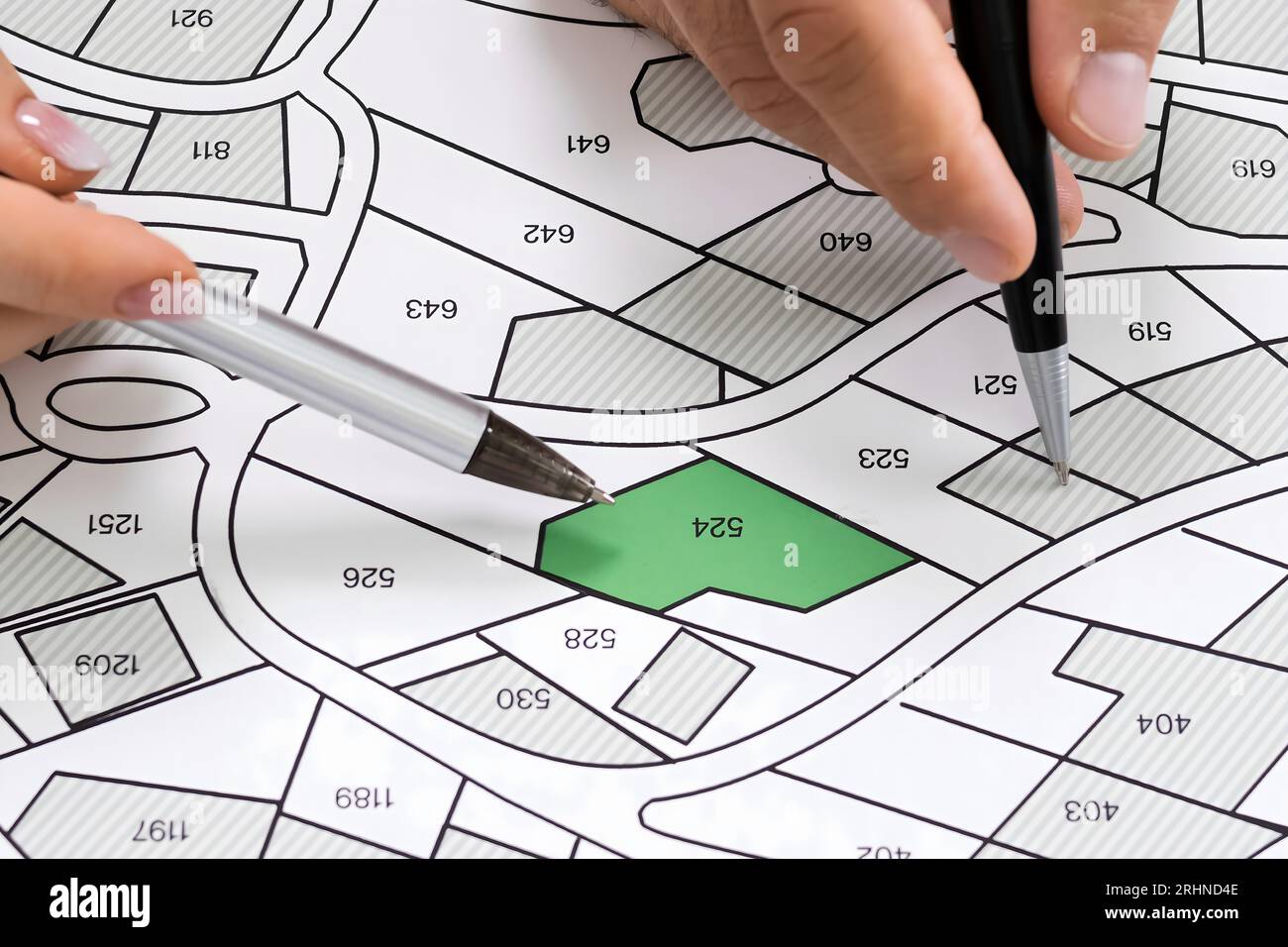 Cadastre Land Map. Cartographer Locating Building Plot Stock Photo - Alamy