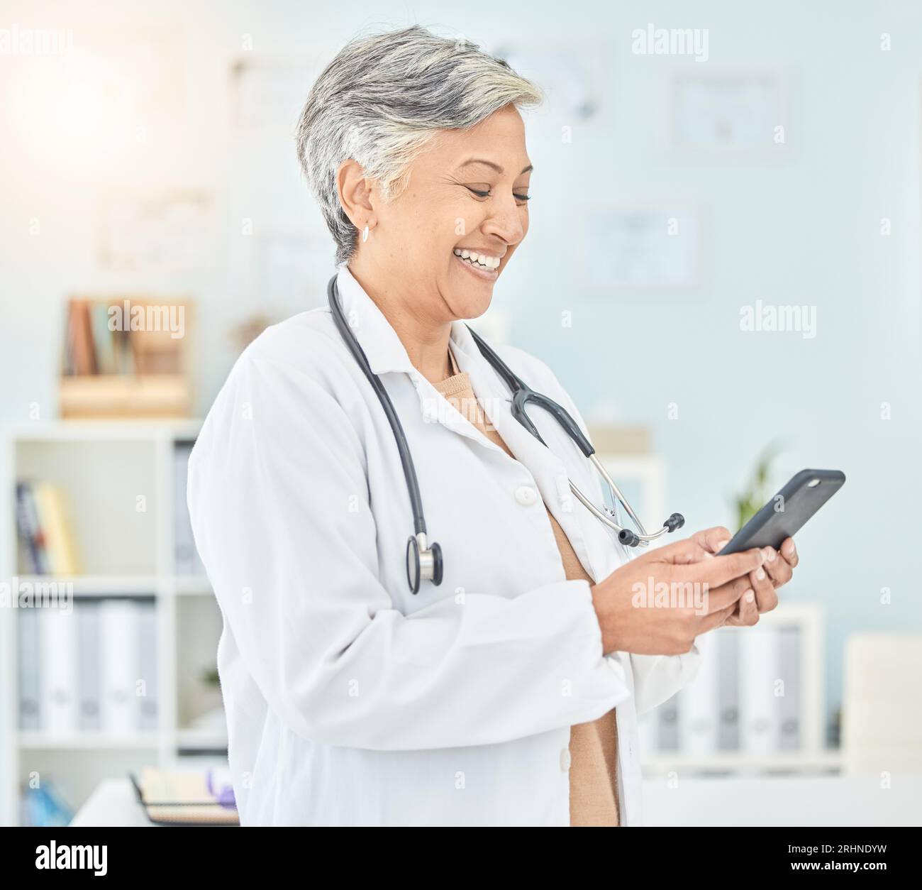 Happy, doctor and woman with phone reading communication, contact or ...